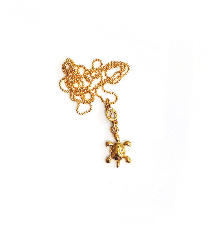 Tiny Gold Gucci Cutout “GG” Charm and Vintage Turtle Charm Necklace ...